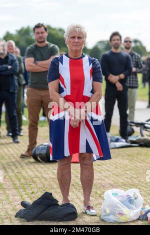 A woman mourner wearing a Union Jack dress, in Hyde park watching the ...