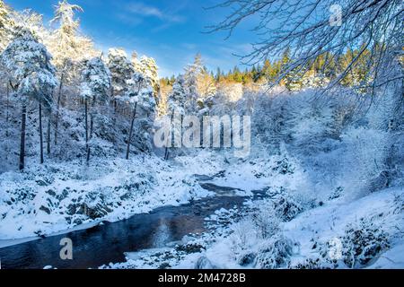 River Findhorn Moray Scotland with deep snow in winter the river water ...