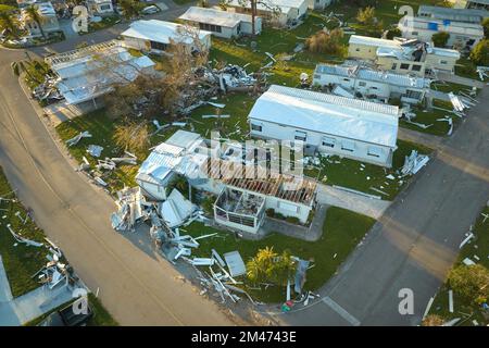 Severely damaged houses after hurricane Ian in Florida mobile home ...