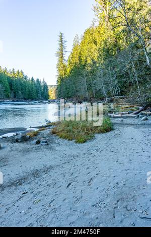 Large rocks line the Snoqualmie River in Washington State Stock Photo ...