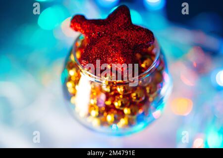 Little christmas baubles in wineglasses on a dark background Stock ...