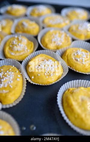 Yellow saffron buns with suger sprinkled on Stock Photo - Alamy