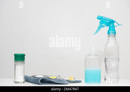 Home cleaning products in reused plastic bottles. Recycled household ...
