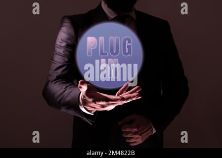 Text sign showing Plug In. Business concept putting device into ...