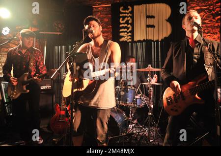 SXSW - Graffiti 6 in concert Stock Photo - Alamy