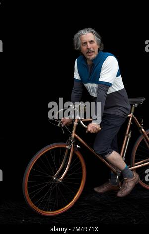 bicycle collector with vintage historic retro bicycle and black ...