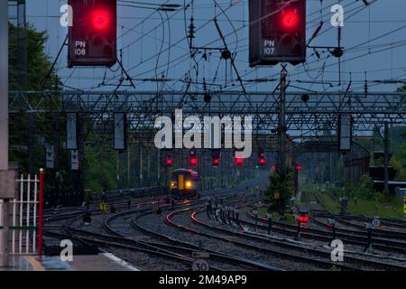 Surrounded by red danger signals a Northern rail class 153 train ...