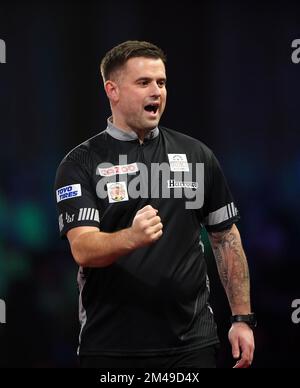 England's Luke Woodhouse in action against Wales' Gerwyn Price during ...