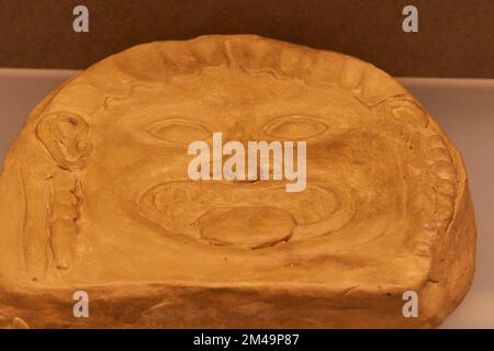 Antefix, frontal tile of a building, head of a gorgoneion, standing ...