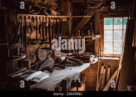 The old-fashioned metal parts and mechanisms in the wooden room Stock ...