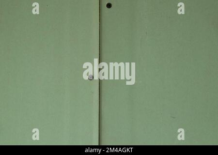 plasterboard green on the wall, room repair Stock Photo - Alamy