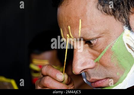 The make up of the Kathakali-character Jayantha step by step Stock ...