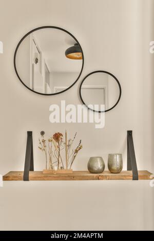 Interior passage way with mirror on wall in modern house Stock Photo ...