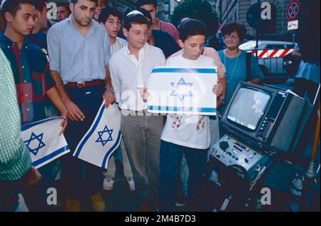 Italian Jews out the synagogue celebrating the reciprocal aknowledgment ...