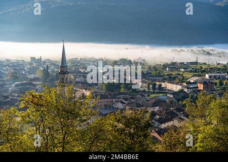 village view and fog, fonzaso, italy Stock Photo - Alamy