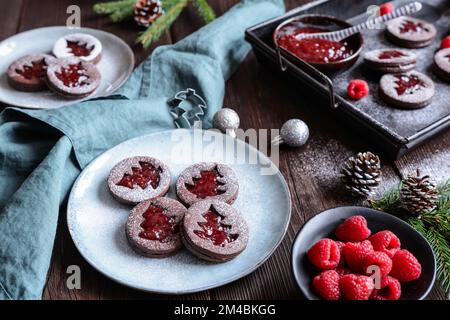 Delicious Christmas cocoa linzer cookies with raspberry jam Stock Photo ...