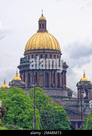 Russian Federation. Saint-Petersburg. June, summer. A burnt-out car as ...