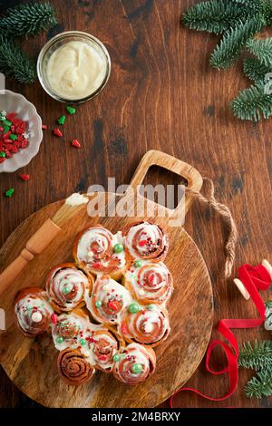 Christmas tree shape cinnamon rolls or cinnabon buns with cinnamon and ...