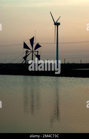 Ancient and new wind mill use for move the sea water into the salt ...
