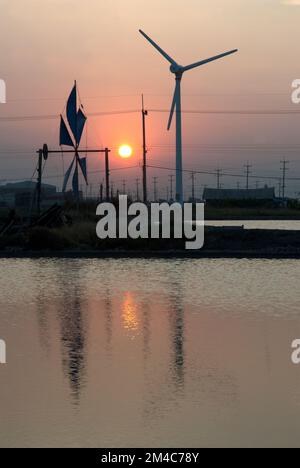 Ancient and new wind mill use for move the sea water into the salt ...