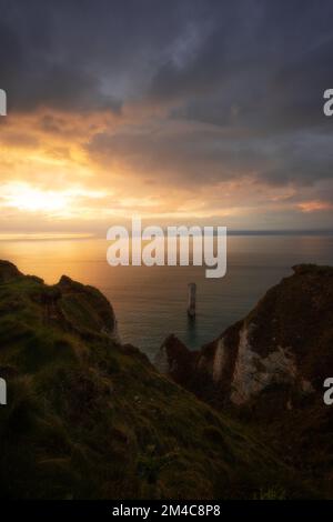 A sunset view of hite cliffs of Etretat and the Alabaster Coast ...