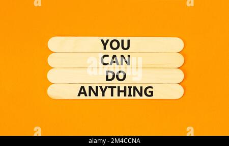 You can do anything symbol. Concept word You can do anything on wooden ...