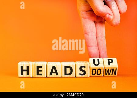 Heads up or down symbol. Concept words Heads up Heads down wooden cubes ...