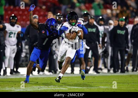 North Texas Mean Green wide receiver Damon Ward Jr. (8) is brought down ...
