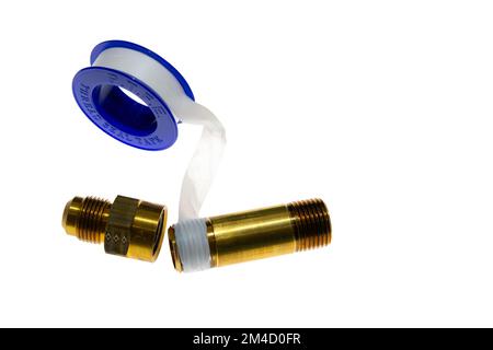 Teflon tape wrapped around the threads of the bronze pipe protects the ...