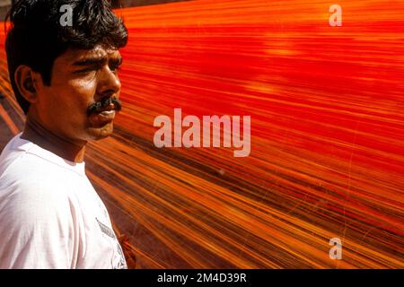 Labor dying threads for industrial use Stock Photo - Alamy