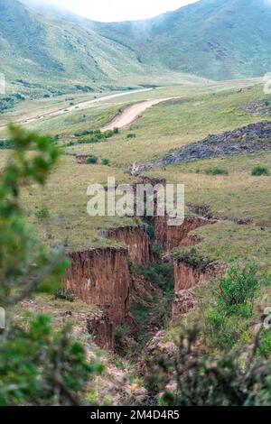 a large crack in the ground after seismic activity Stock Photo - Alamy