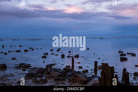 Rocks and sea breakers off the Frisian coast, Netherlands Stock Photo ...