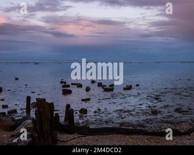 Rocks and sea breakers off the Frisian coast, Netherlands Stock Photo ...