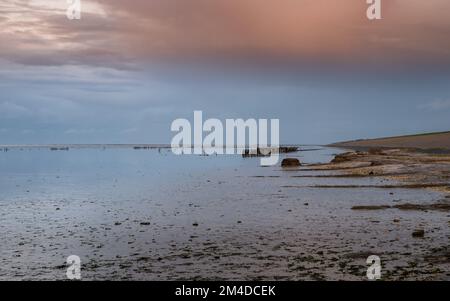Rocks and sea breakers off the Frisian coast, Netherlands Stock Photo ...