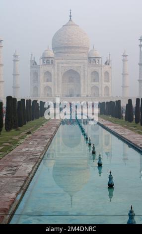 The Taj Mahal is an Islamic ivory-white marble mausoleum on the right ...