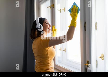 Female hand with rag washing window in room, closeup Stock Photo - Alamy