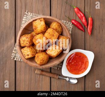 Tapioca dice, typical northeast brazilian food with chilli pepper syrup ...