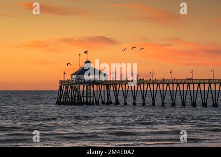 Sunset seascape with panoramic view of Imperial Beach Pier and the Tin ...