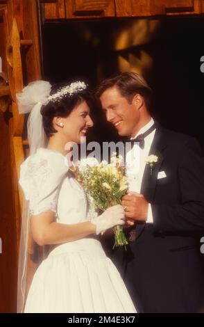 young happy couple smiling with new real estate Stock Photo - Alamy