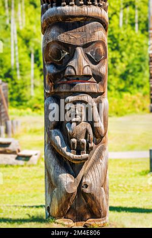 Hand carved cedar totem poles; Gitanyow - Kitwancool Historic Village ...