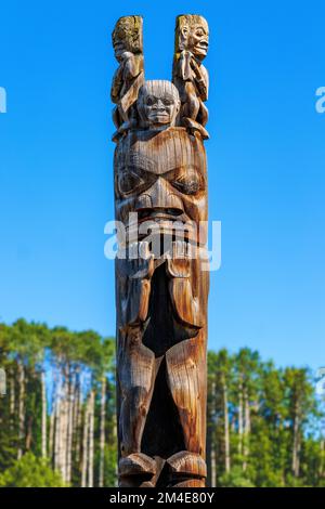 Hand carved cedar totem poles; Gitanyow - Kitwancool Historic Village ...