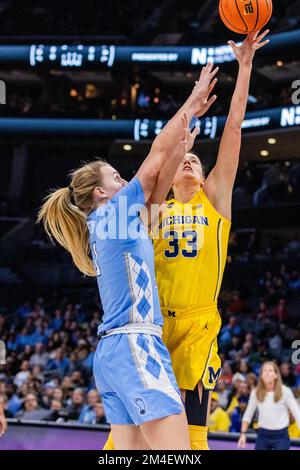 Michigan forward Emily Kiser (33), is defended by Indiana forward Lilly ...