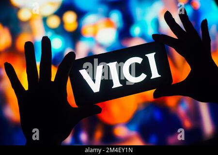 In this photo illustration, the VICI Properties logo is displayed on a ...