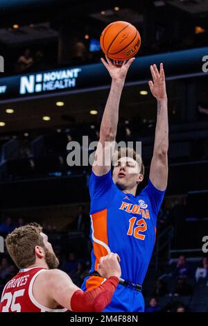 Charlotte, NC, USA. 20th Dec, 2023. Florida Gators guard Alberte Rimdal (5) attempts a three ...