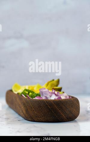 avocado, onion and cilantro, to accompany meat in its juice, typical ...