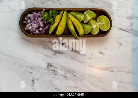 avocado, onion and cilantro, to accompany meat in its juice, typical ...