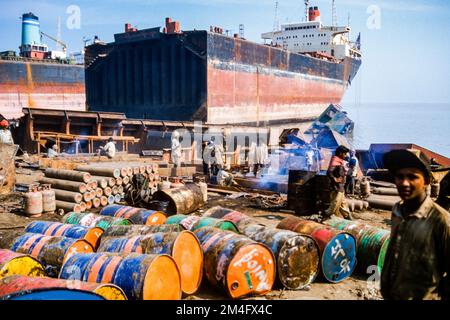 Indian workers working at Alang ship breaking yard ; Alang ; Bhavnagar ; Gujarat ; India ; Asia ...