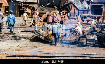 Indian workers working at Alang ship breaking yard ; Alang ; Bhavnagar ; Gujarat ; India ; Asia ...