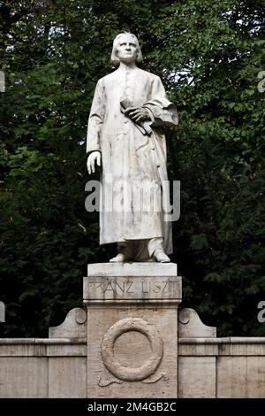 Franz Liszt standing in front of music stand. Hungarian pianist and ...