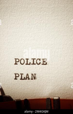 Police plan phrase written with a typewriter Stock Photo - Alamy